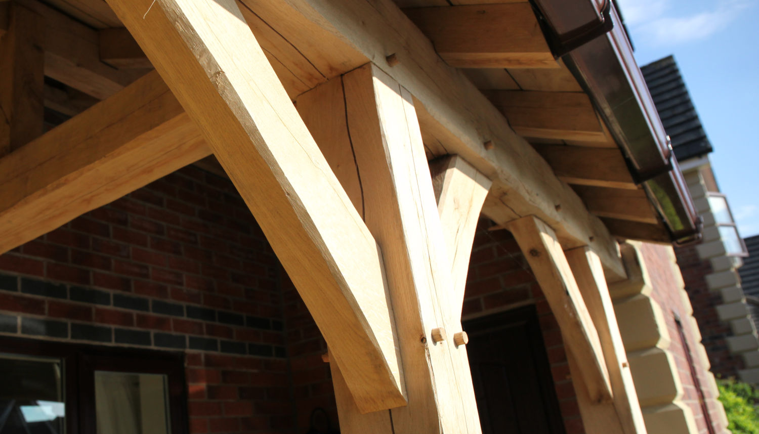 carport, oak framed design, hipped end, on staddle stones with lead hip ...